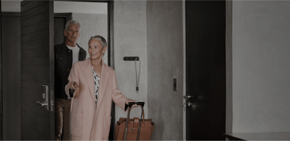 Onity-Trillium-lock-couple-entering-room-footer